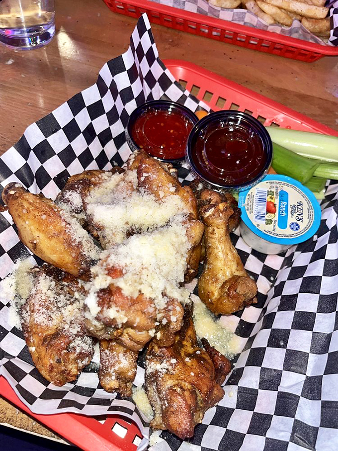 Garlic Parmesan wings: Where Italian nonnas and American sports bars find common ground. A cheesy, garlicky match made in heaven.