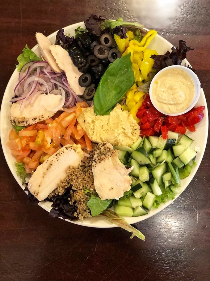 A Greek power bowl that's a feast for the eyes and the stomach. It's like someone raided the Garden of Eden and put it on a plate.