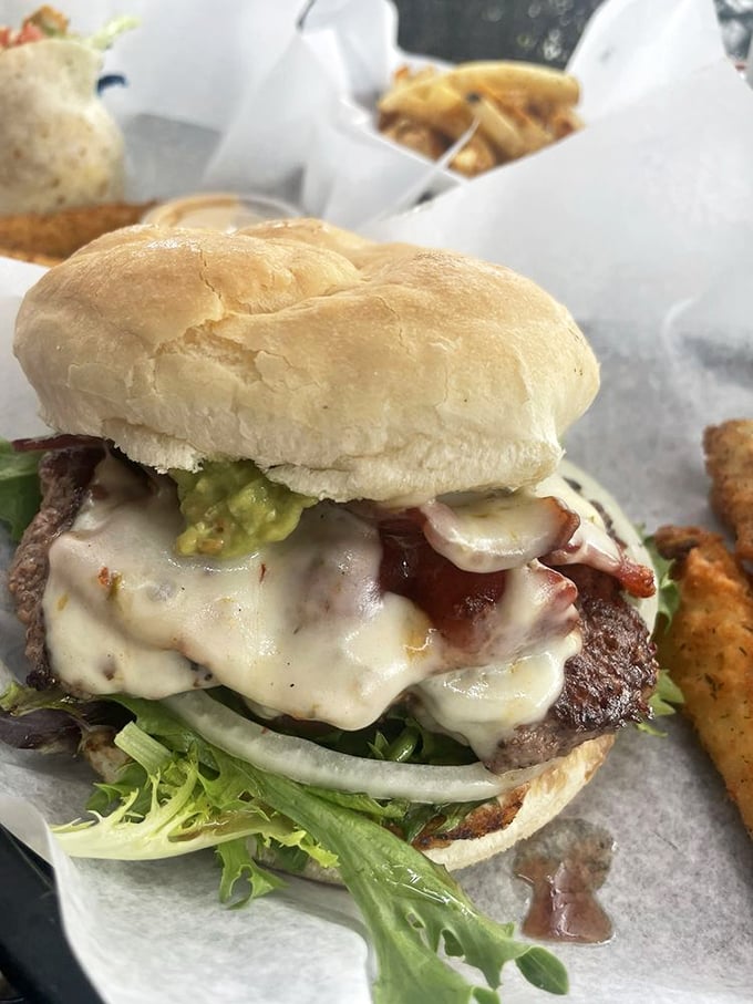 Guac this way! This bacon cheeseburger with a creamy avocado twist is like a fiesta in your mouth.