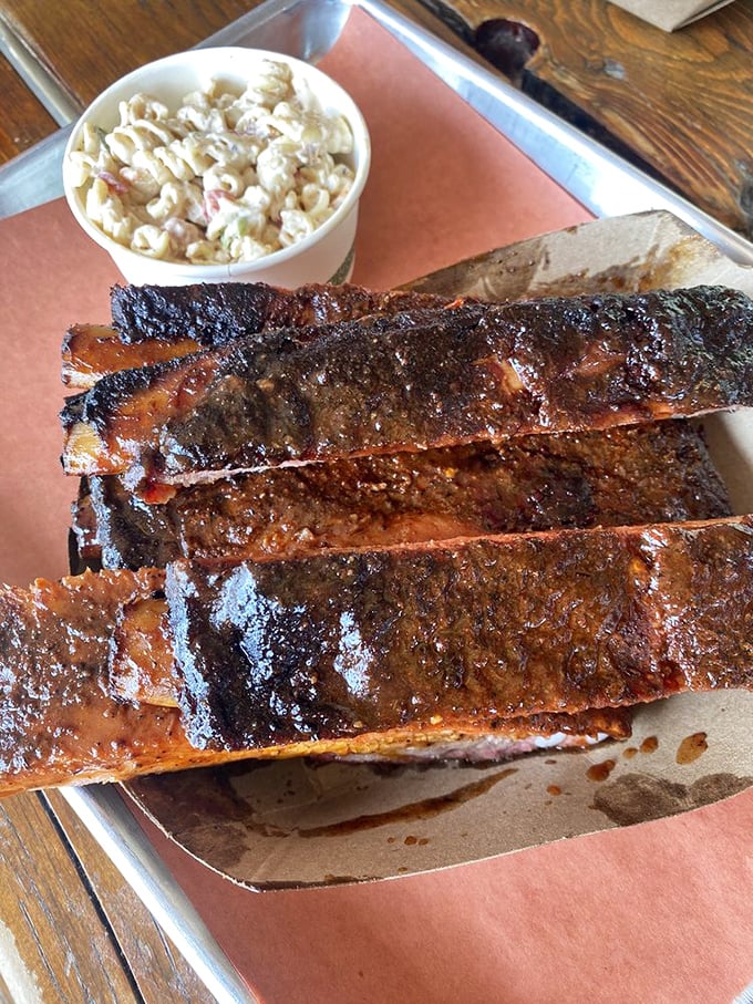 Half a rack of ribs, full-on flavor explosion. These beauties are so good, you might forget your table manners and lick the plate.