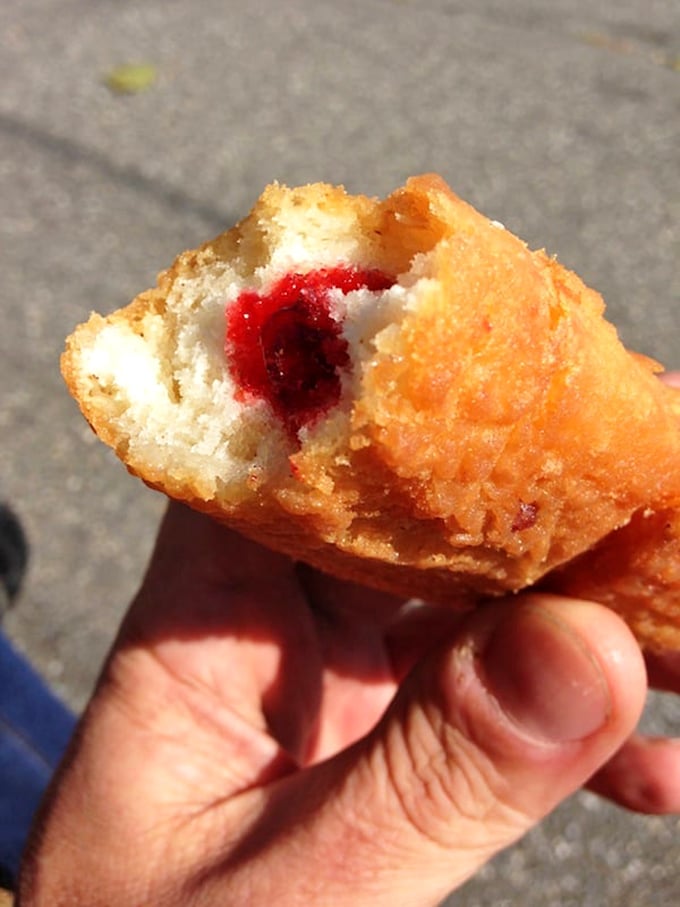 Peek-a-boo, I see you! This jelly-filled delight is like a tasty magic trick &ndash; now you see the filling, now you don't!