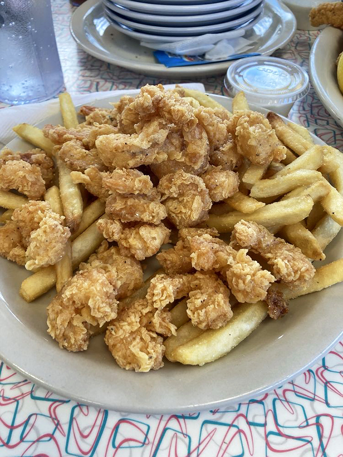 Crispy, golden, and utterly irresistible! These kid-sized fried shrimp are like little nuggets of joy, perfect for future food critics.