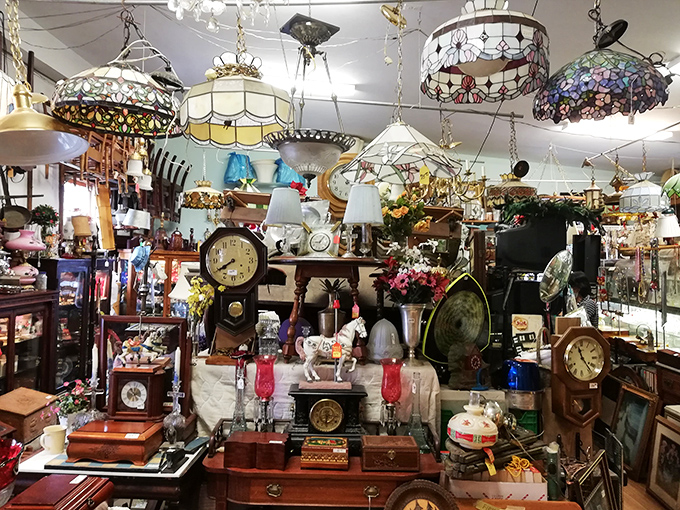 Time stands still... literally! This dazzling display of vintage timepieces and lamps could light up even the Addams Family mansion.