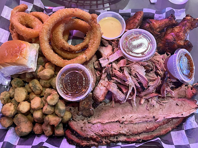 The carnivore's dream team! This platter's like an all-star lineup of BBQ favorites, ready to hit a home run for your taste buds.