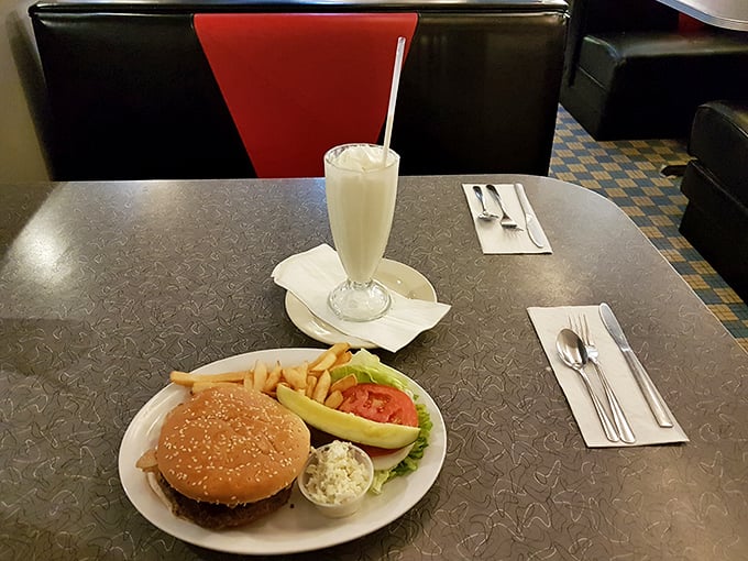 The classic diner duo: a juicy burger and a frosty shake. It's like Bonnie and Clyde, but instead of robbing banks, they're stealing hearts.