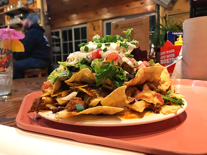 These loaded nachos are a fiesta on a plate, each chip a crunchy vessel for a flavor explosion.