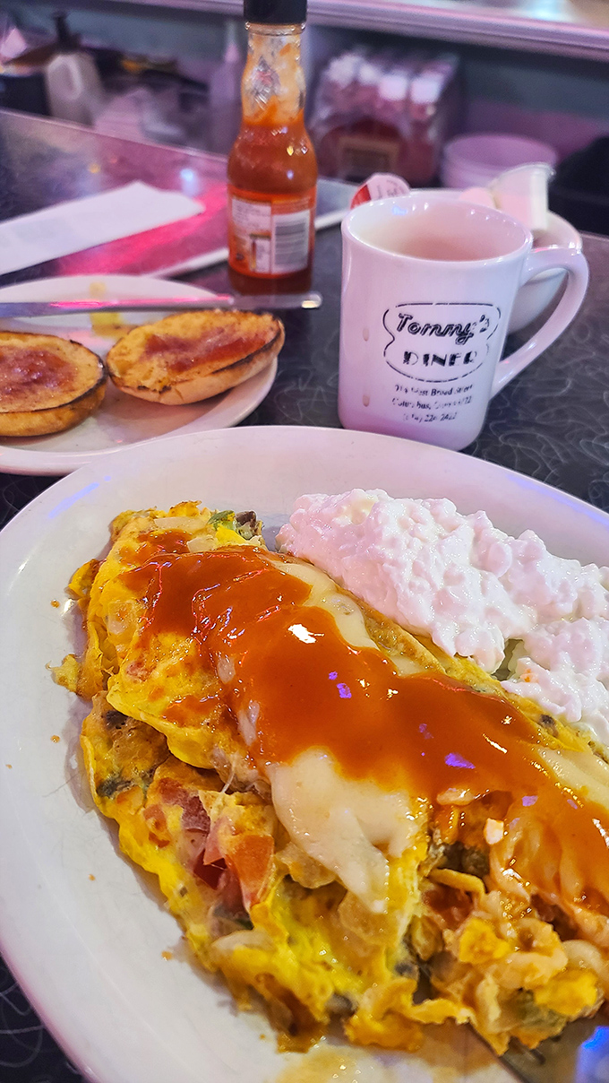 Eggs-actly what the doctor ordered! This omelet is so stuffed, it could moonlight as a pillow.