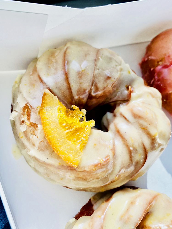 Sunshine on a plate! This orange creamsicle French cruller is what happens when your childhood ice cream truck dreams grow up and get fancy.