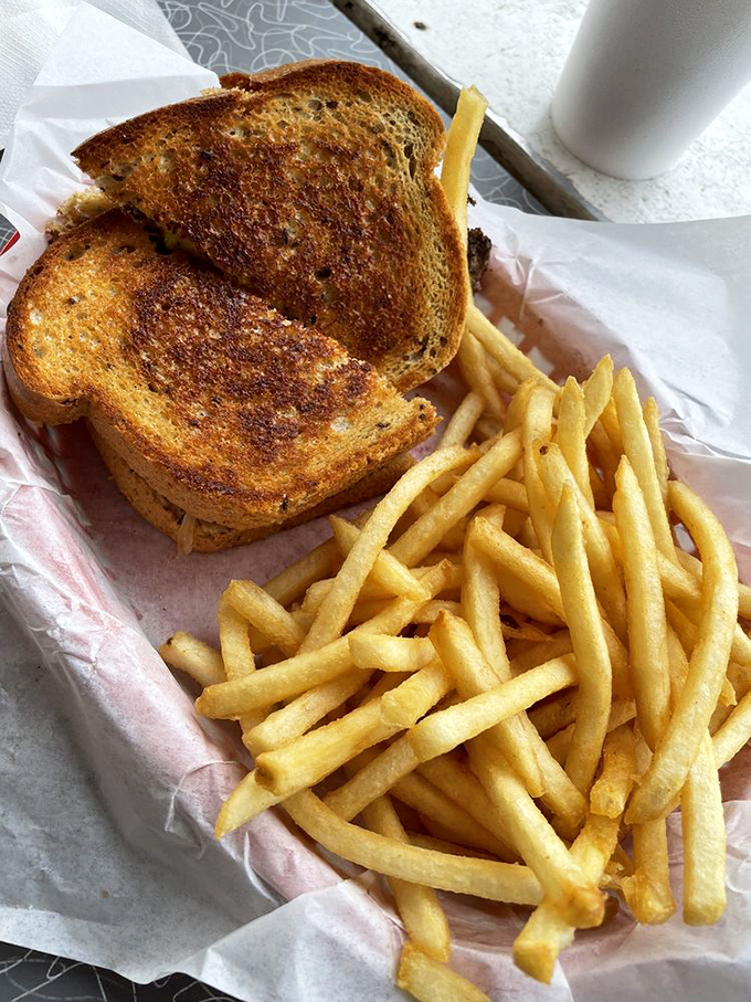 The classic patty melt: Where burger meets grilled cheese in a union blessed by the sandwich gods. Those fries aren't too shabby either!
