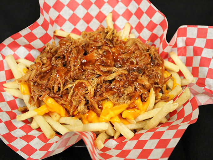 Porky cheese fries: because sometimes you need to remind your arteries who's boss. Diet starts tomorrow, right?