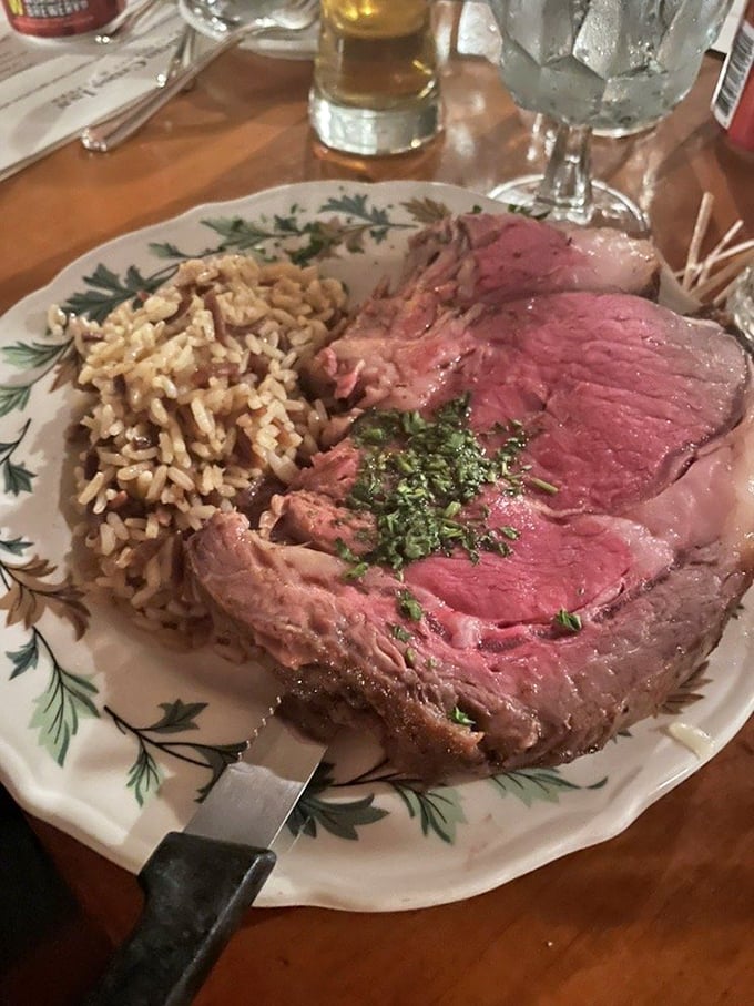 Rice, rice, baby! This prime rib's wingman is a fluffy bed of grains, ready to soak up every drop of meaty goodness. It's a dynamic duo of deliciousness.