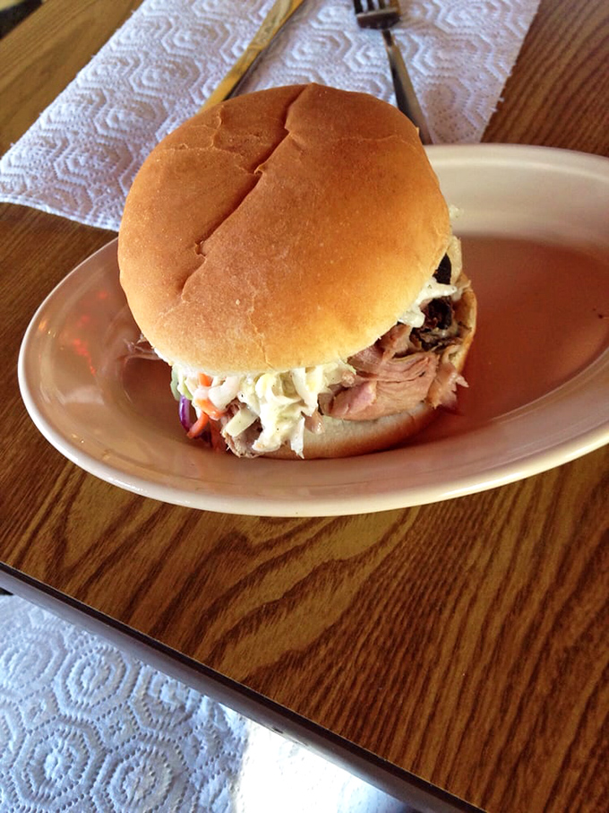 The sandwich of champions! This pulled pork burger is piled so high, it's like the Leaning Tower of Deliciousness. Napkins required!