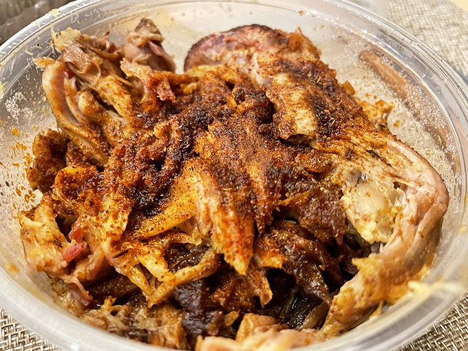 Pulled pork perfection! So juicy and tender, it's like the BBQ gods themselves blessed this heavenly heap of porky goodness.