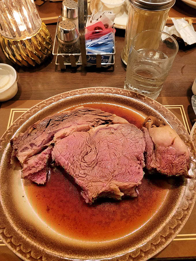 This prime rib is so rare, it might start mooing. A carnivore's dream come true, served with a side of pure joy.