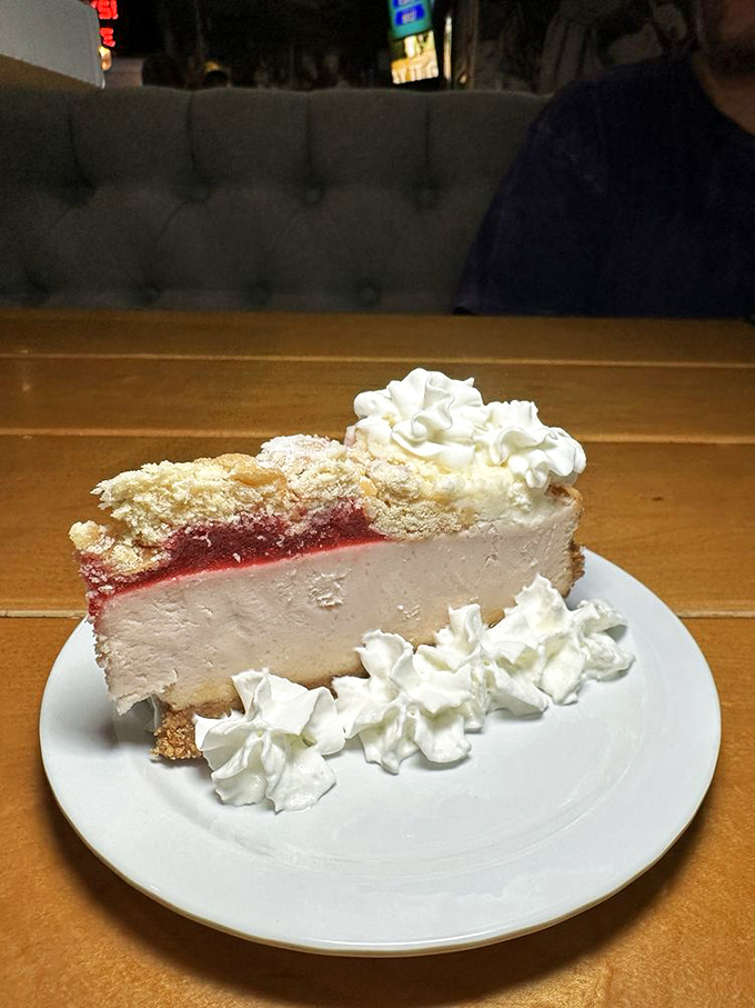 A slice of raspberry heaven that's smoother than a home run swing. This cheesecake is a grand slam for your taste buds.