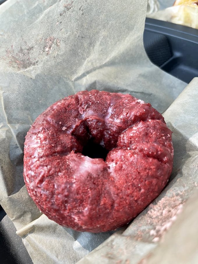 Red velvet royalty! This crimson creation isn't just a donut; it's a crown jewel in the pastry kingdom. Bow down, mere mortals!