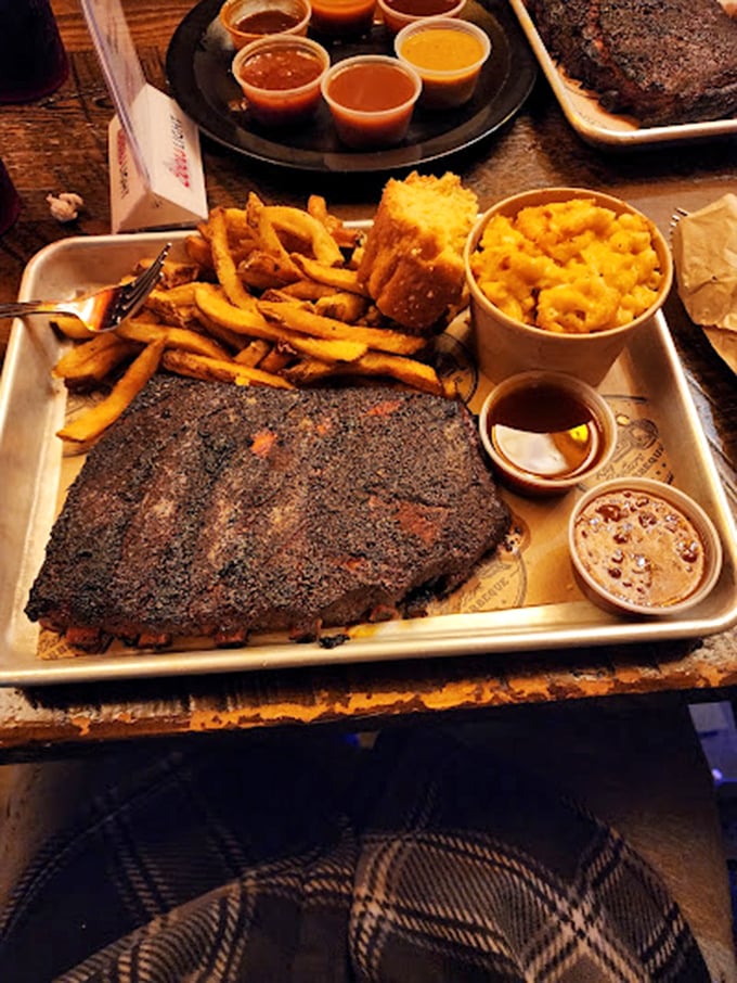 The ultimate BBQ trifecta! Ribs, fries, and mac and cheese – it's like the Three Tenors of comfort food.