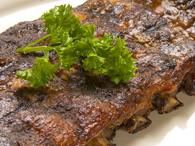 Ribs so tender, they practically fall off the bone with a stern look. These bad boys put the 'rib' in Rib & Chop House!
