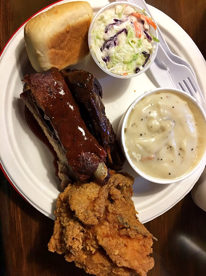 The ultimate power couple: ribs and chicken joining forces to create a flavor explosion. With sides this good, it's a full-fledged taste bud party.