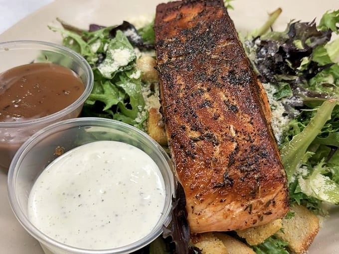 Who says diners can't do healthy? This blackened salmon perches atop fresh greens like it's auditioning for a cooking show.