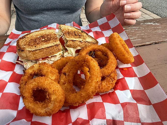 Ring-a-ding-ding! This sandwich and its crispy onion ring sidekicks are ready for their delicious close-up. Cue the stomach growls!