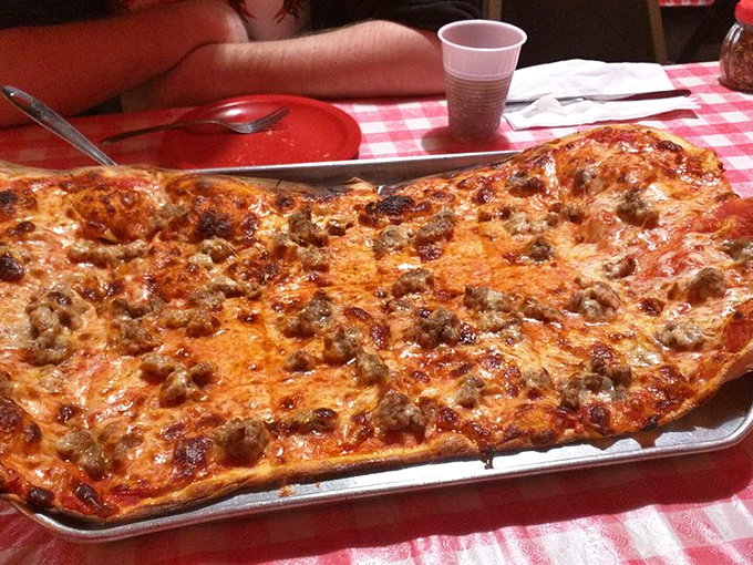 Sausage sensation! This pie is dotted with savory morsels of meaty goodness, making each bite a flavorful adventure for your mouth.