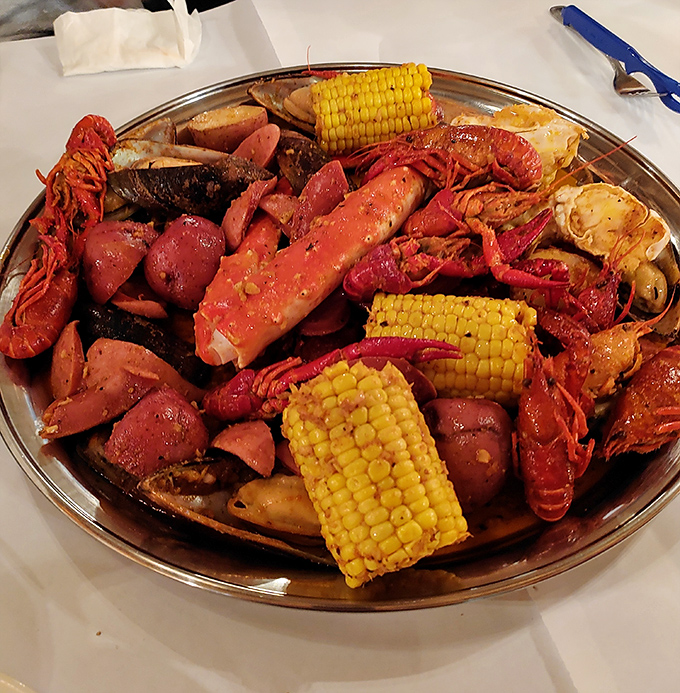 Behold, the seafood boil in all its glory! It's a cornucopia of crustaceans that would make Aquaman himself jealous.