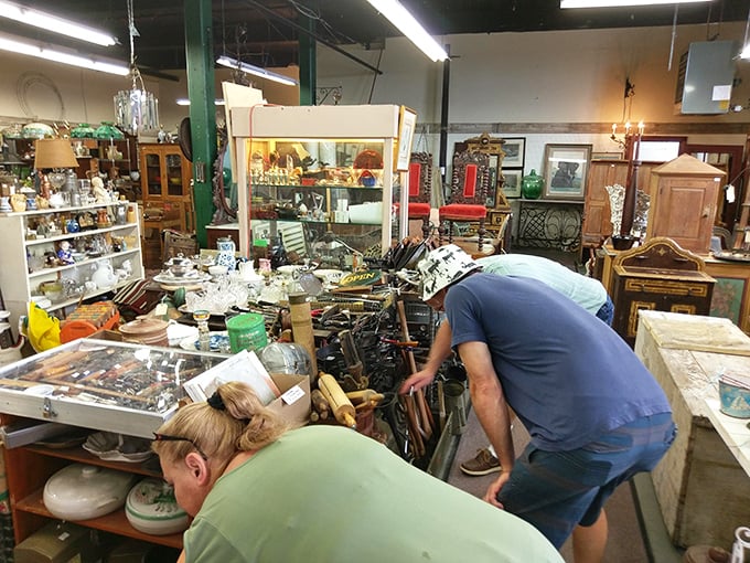 Treasure hunters in their natural habitat! Watch as they navigate the sea of vintage goodies, eyes peeled for that perfect find. It's like "Indiana Jones" meets "Antiques Roadshow"!