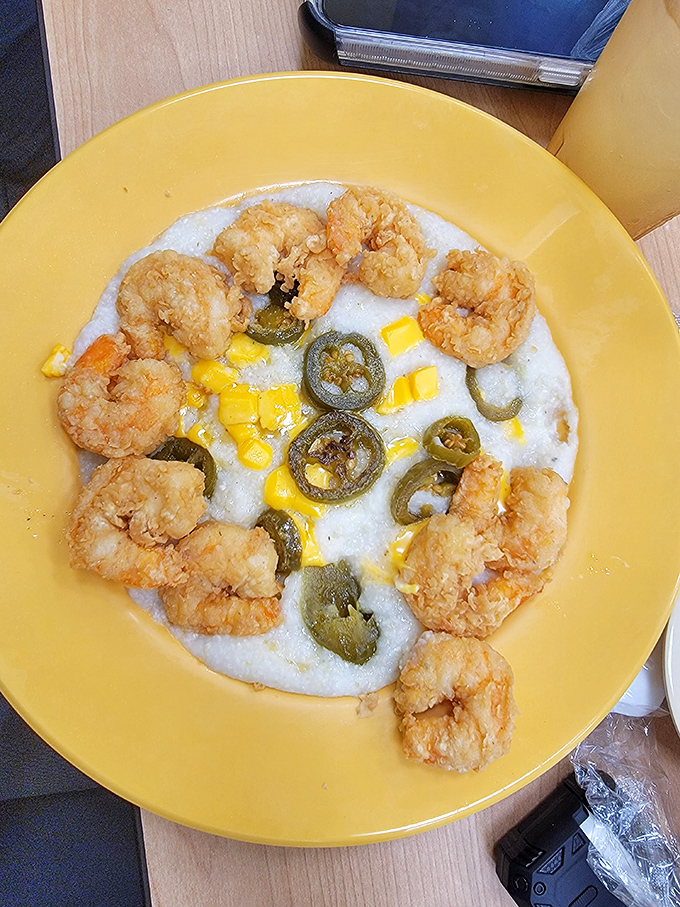 Shrimp and grits: where seafood meets comfort food in a dance of flavors that'll make your mouth do the cha-cha. Jalapeños add a spicy twist!
