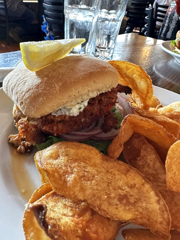 Surf meets turf in sandwich form! This smoked salmon burger with crispy chips is the catch of the day you'll want to reel in.