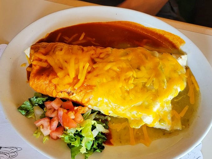 The smothered burrito arrives like a gift wrapped in cheese, with red sauce playing the role of the ribbon you can't wait to untie.