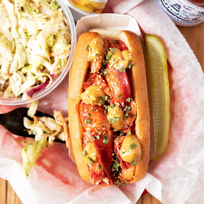 Spice up your life with this Mala Lobster Roll! It's like your taste buds hit the dance floor at a seafood disco.