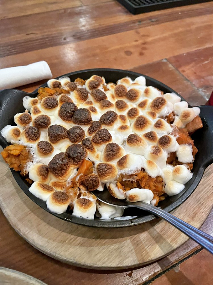 What happens when sweet potato pie meets toasted marshmallows in a cast-iron skillet? A dessert that's essentially childhood nostalgia reborn.