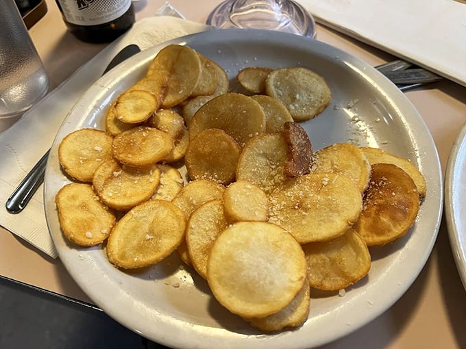 Crispy, golden, and utterly addictive! These tavern-style fries are like potato chips' cooler, more sophisticated cousins. Warning: Sharing may be challenging.