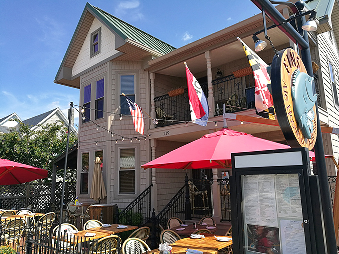 The Sterling Tavern's cheerful patio invites you to linger over lunch. Those Maryland flags aren't just decoration&mdash;they're a proud reminder you're in crab cake territory.
