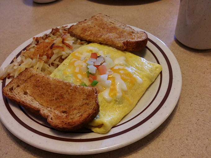 This veggie-packed omelet is proof that eating your greens can be downright indulgent. It's a garden party wrapped in a protein blanket, and you're invited!