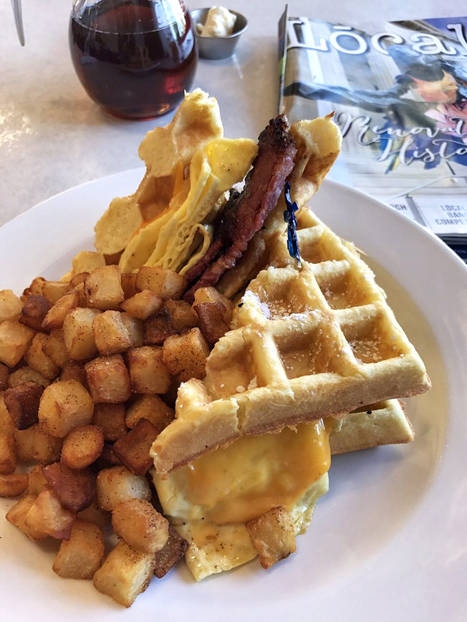 Behold, the breakfast sandwich that puts all other sandwiches to shame! It's a tower of morning glory that'll make you want to high-five the chef.