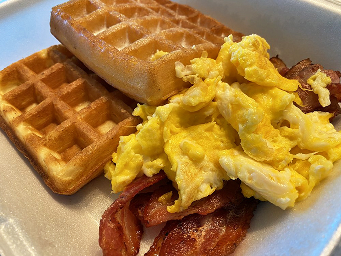 Waffles, eggs, and bacon&mdash;oh my! This plate is like the Wizard of Oz for your taste buds.