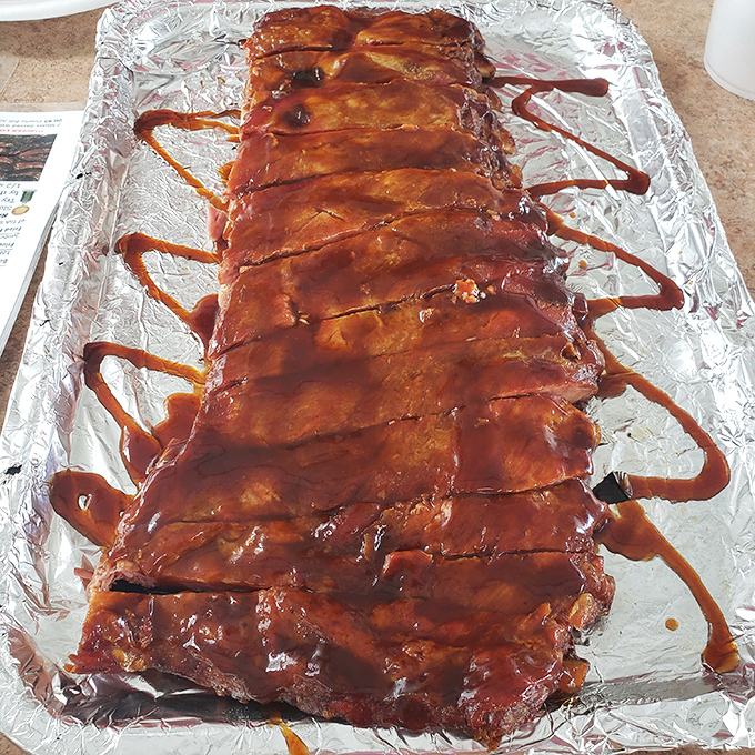 The motherload of meat! This rack of ribs is longer than a Monday morning meeting, but infinitely more enjoyable. Sharing is caring, folks!