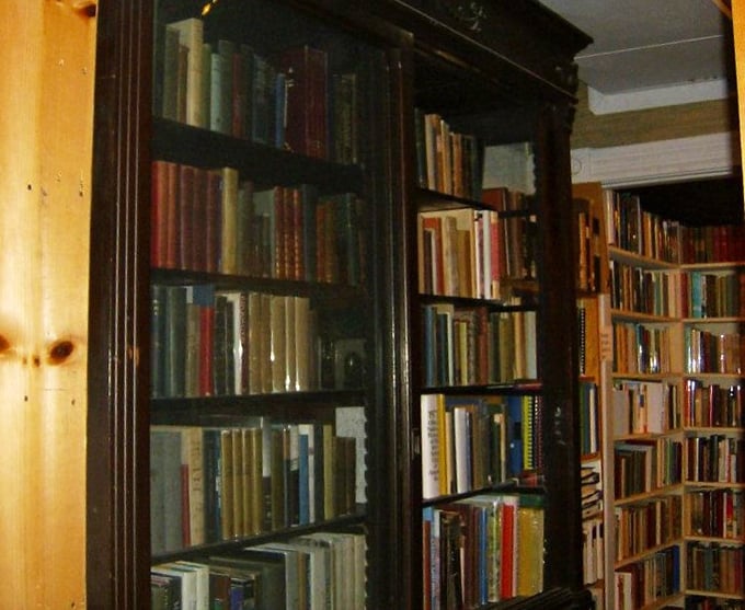 This bookcase is older than most Hollywood marriages. If these shelves could talk, oh the tales they'd tell!