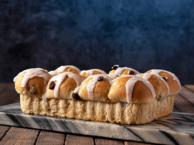 Hot cross buns, hot cross buns! These beauties look so good, you'll be singing nursery rhymes all the way to the cash register.
