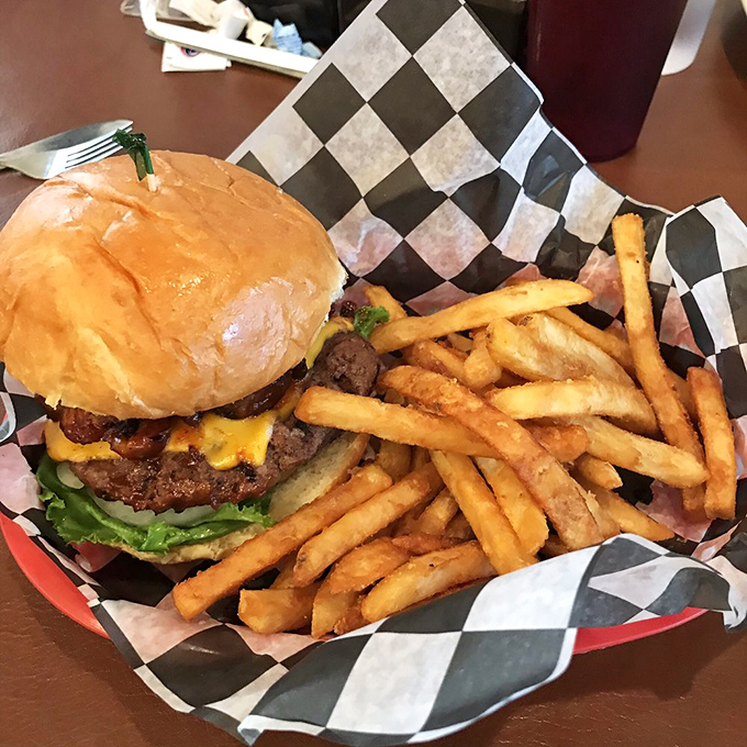 This burger's not just a meal, it's a challenge. Accept it, and you'll be rewarded with a symphony of flavors (and maybe a food coma).