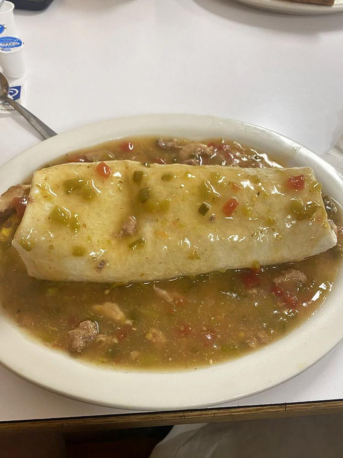 Burrito or edible sleeping bag? This hefty wrap is blanketed in green chili so good, you'll want to curl up and take a nap in its warm, spicy embrace.