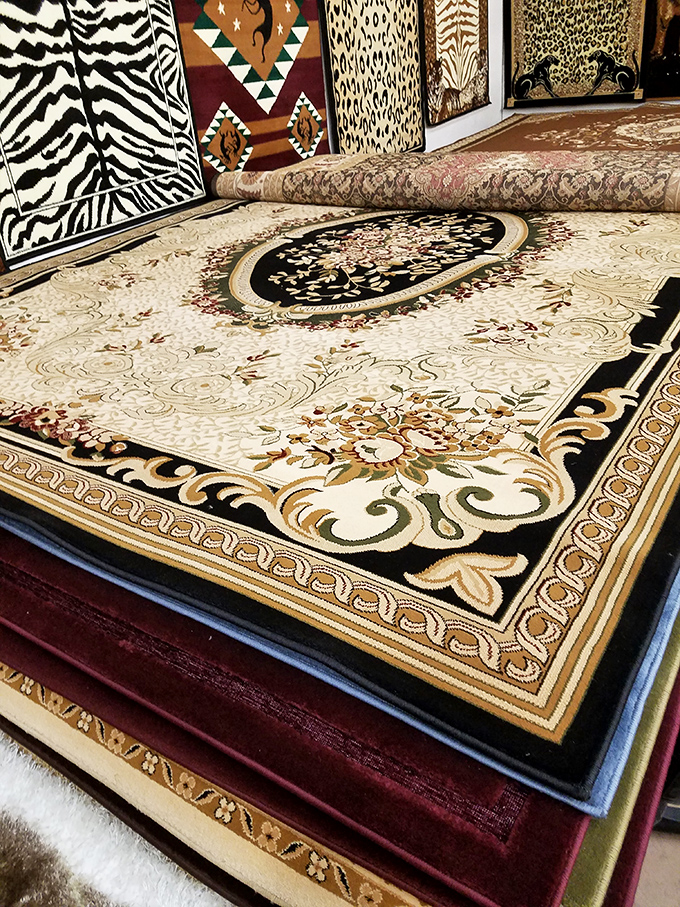 Intricate carpets stacked like pages in a storybook, each one telling tales of distant places. Martha Stewart would have a design epiphany here.