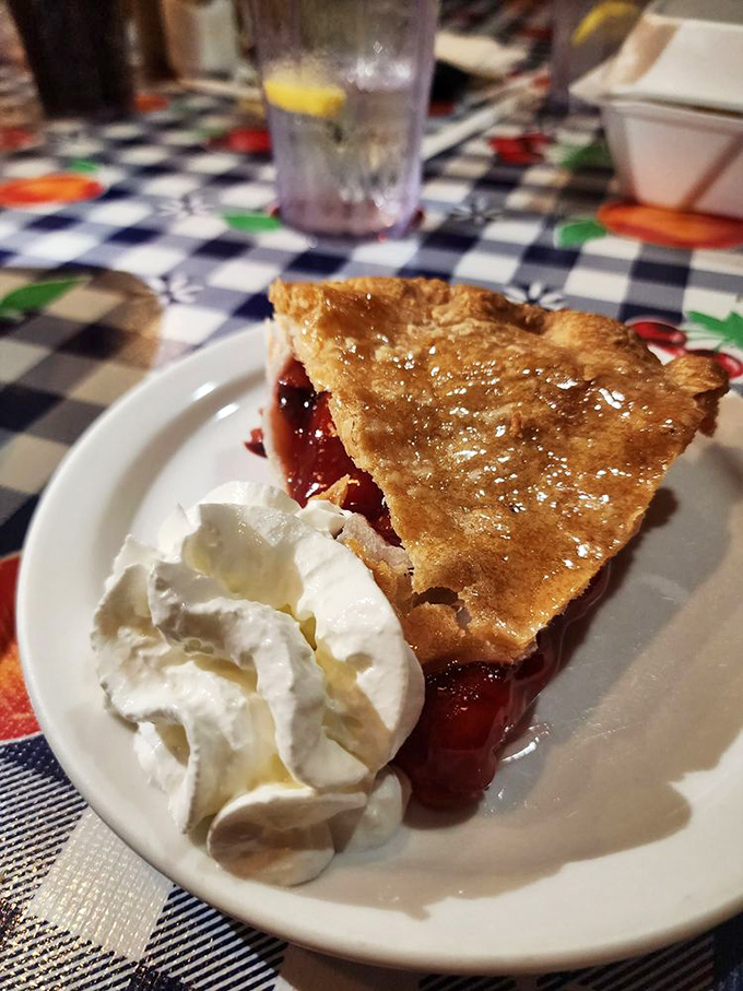 Life is just a bowl of cherries? Nah, it's a slice of this heavenly cherry pie, complete with a dollop of cream that's begging to be Instagrammed.