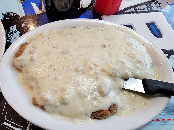 Chicken fried steak: Where gravy dreams come true. This plate of pure comfort could make even a cactus feel warm and fuzzy inside.