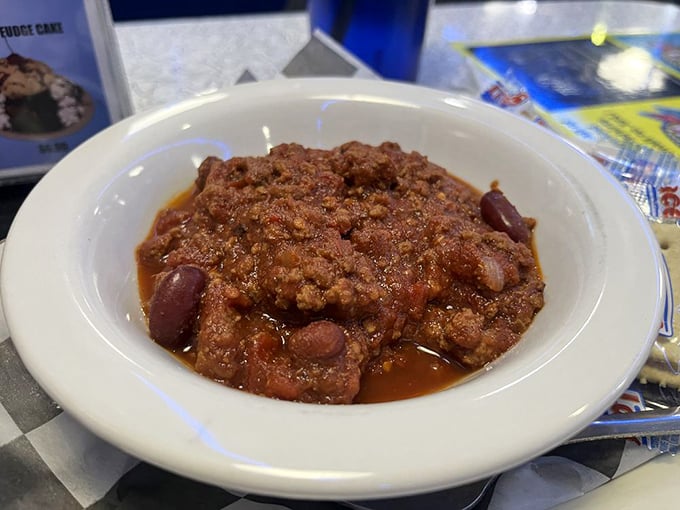 When your chili needs its own area code, you know you're in for a good time. This bowl is hotter than Elvis in his prime!