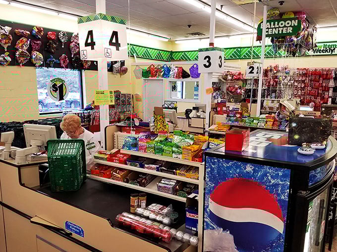 The checkout area&mdash;where impulse buys make their last stand and shopping baskets mysteriously gain five more items than you planned.