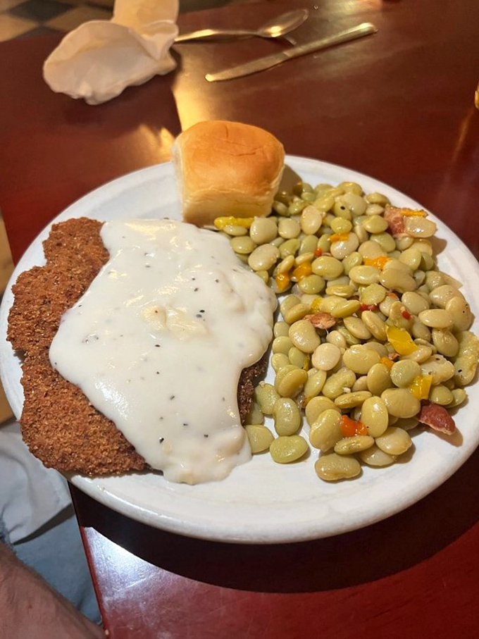 Country fried steak: Where comfort food meets Southern charm. It's like a warm hug from your favorite aunt, but crispier.