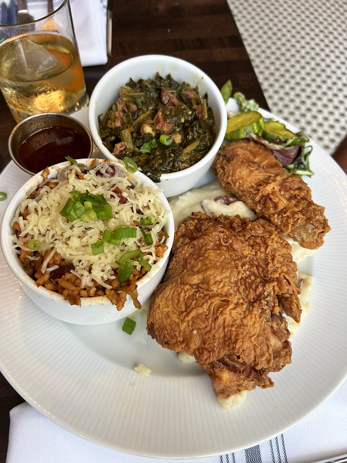Fried chicken that's crispier than a new dollar bill. Paired with collard greens, it's a match made in Southern heaven.